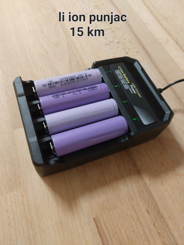Punjac za li ion baterije univerzalni - Aku baterije i punjači - OLX.ba